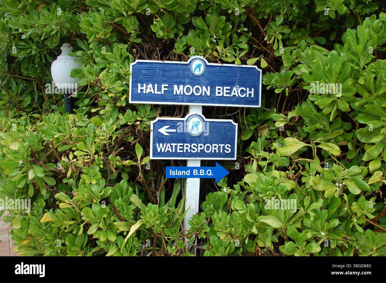 Directional signs for Half Moon Beach, watersports, and Island BBQ ...