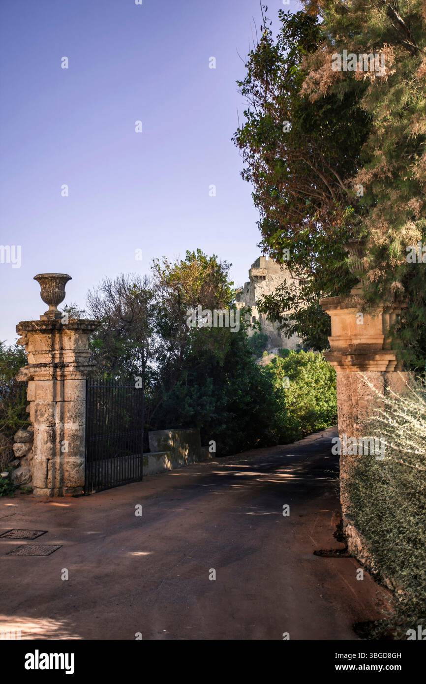 Falconara, Italy 1 January 2025: Stone gate leading to the falconara ...
