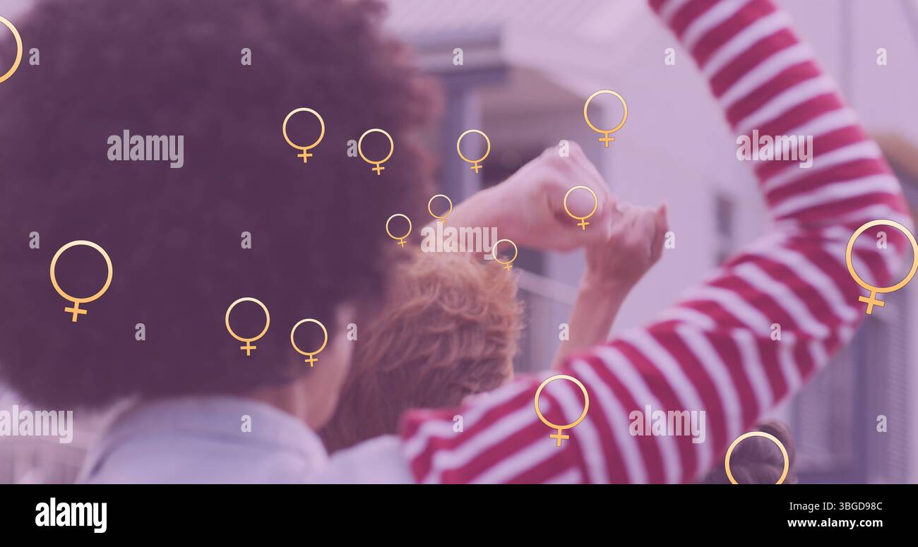 Image of falling women symbols over two diverse women raising fists ...