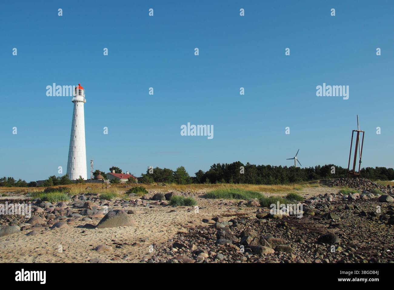 Coastal Lighthouse and Memorial Structure with Wind Turbines in the ...