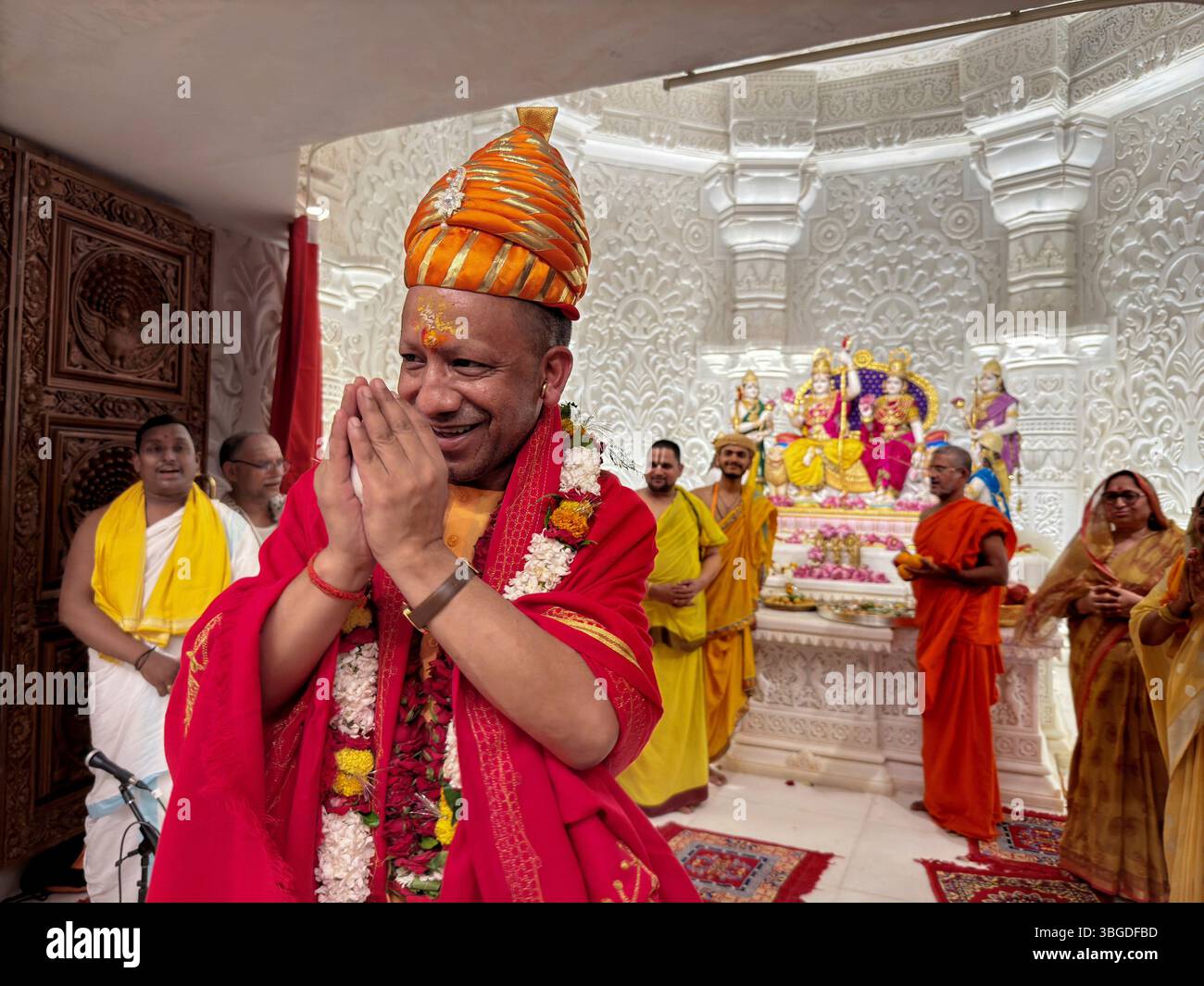 Uttar Pradesh chief minister Yogi Adityanath greets Hindu holy men, at ...
