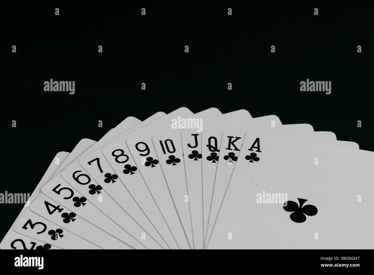 Playing Cards of Club Suit Arranged in a Perfect Arc on Dark Background ...