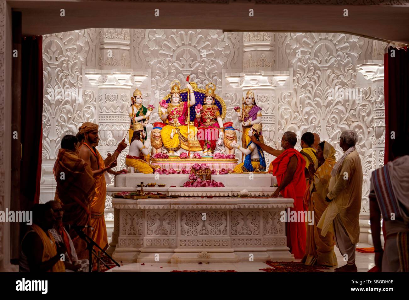 Hindu priests perform the consecration ceremony of new idols of deities ...