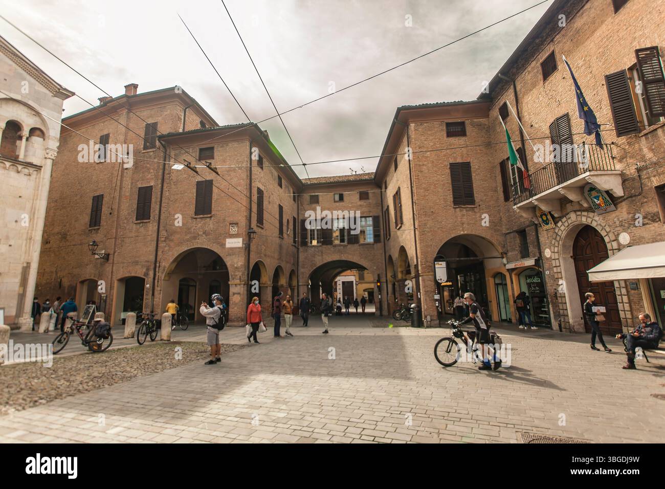 Modena, Italy 1 January 2025: Tourists enjoying piazza xx settembre in ...