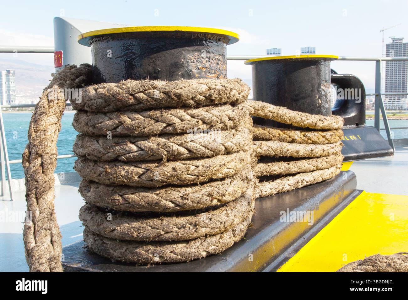 The mooring rope is fixed to the bollard on the ship Stock Photo - Alamy