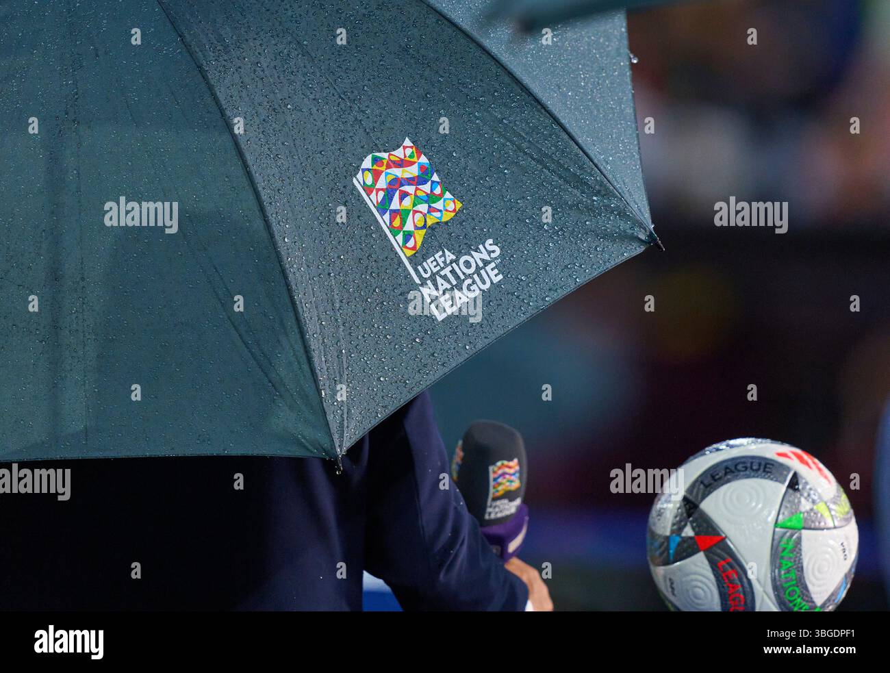 TV journalist with Ball in the UEFA Nations League 2025 semi final match GERMANY - PORTUGAL 1-2 ...