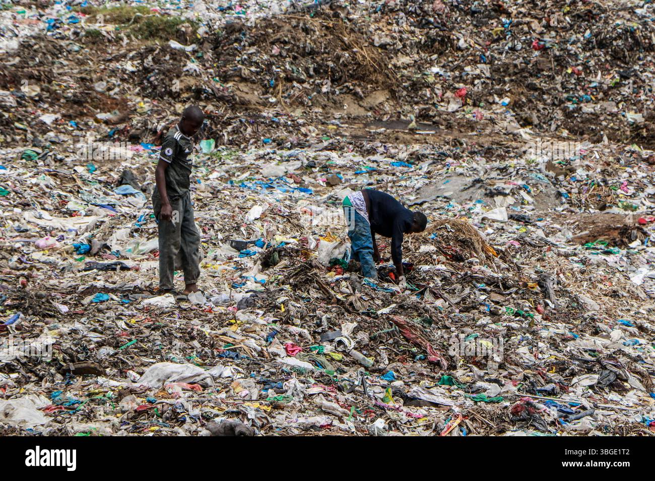 Nakuru, Kenya. 04th June, 2025. Informal waste workers collect ...