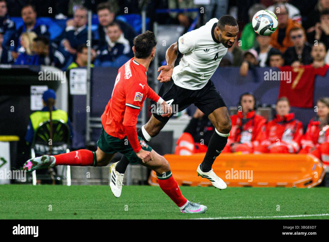 MUNICH, GERMANY - 4 JUNE, 2025: Bruno Fernandes, Jonathan Tah - The ...
