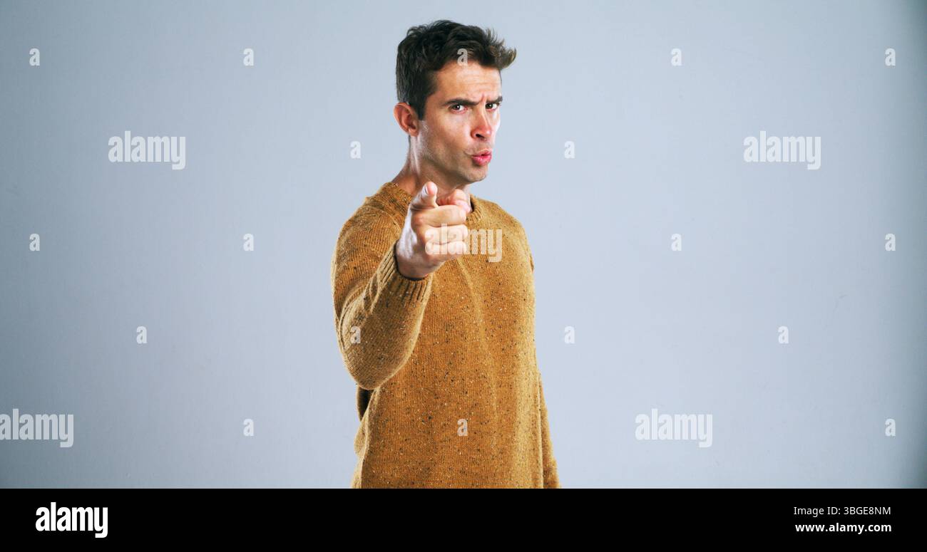 Serious teacher pointing finger in hi-res stock photography and images ...