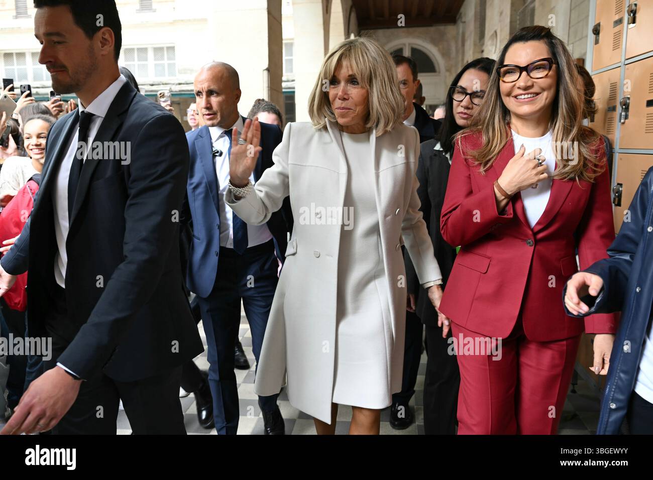 French President Emmanuel Macron's wife Brigitte Macron, center, and ...
