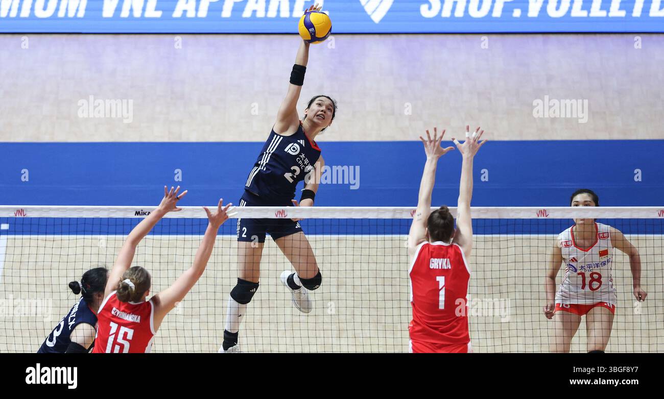 Beijing, China. 5th June, 2025. Zhuang Yushan (top) of China spikes the ...