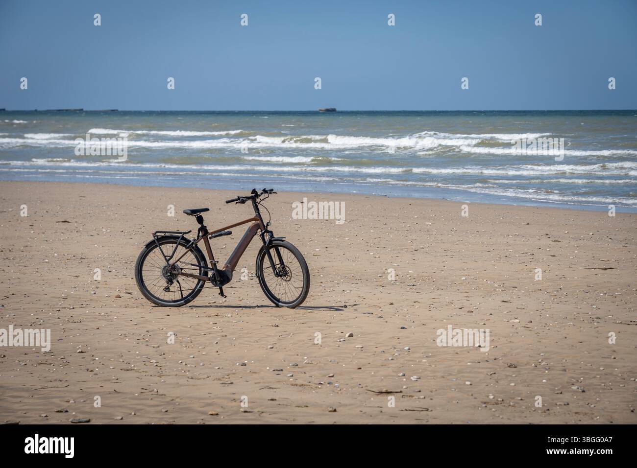 Asnelles-Sur-Mer, France - 05 16 2025: An electric bike standing on its ...