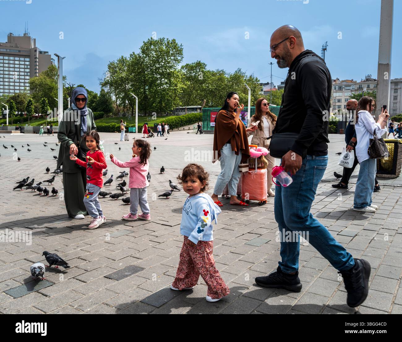 Sunday morning street scene in Taksim Square, Istanbul, Turkey Stock ...
