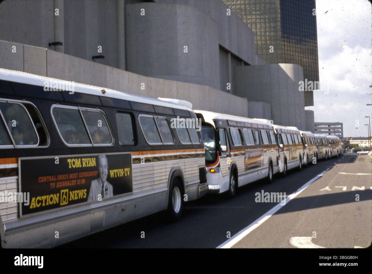 A row of COTA buses is seen by the Greater Columbus Convention Center ...