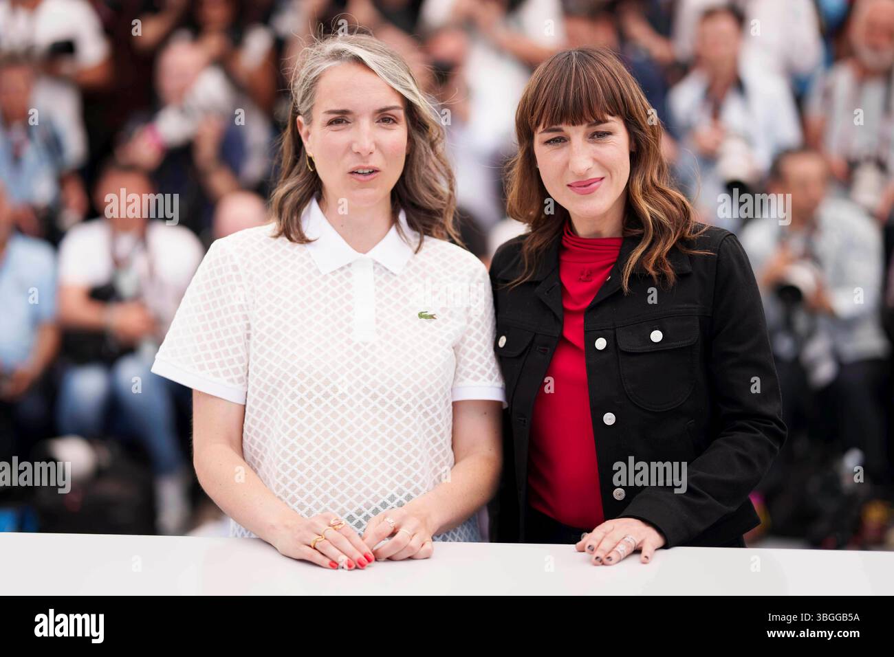 Amelie Bonnin, left, and Juliette Armanet pose for photographers photo ...
