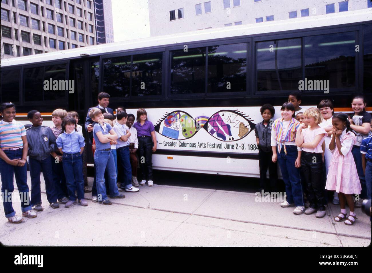 In June 1984, Dana 'Buck' Rinehart stands with schoolchildren in front ...