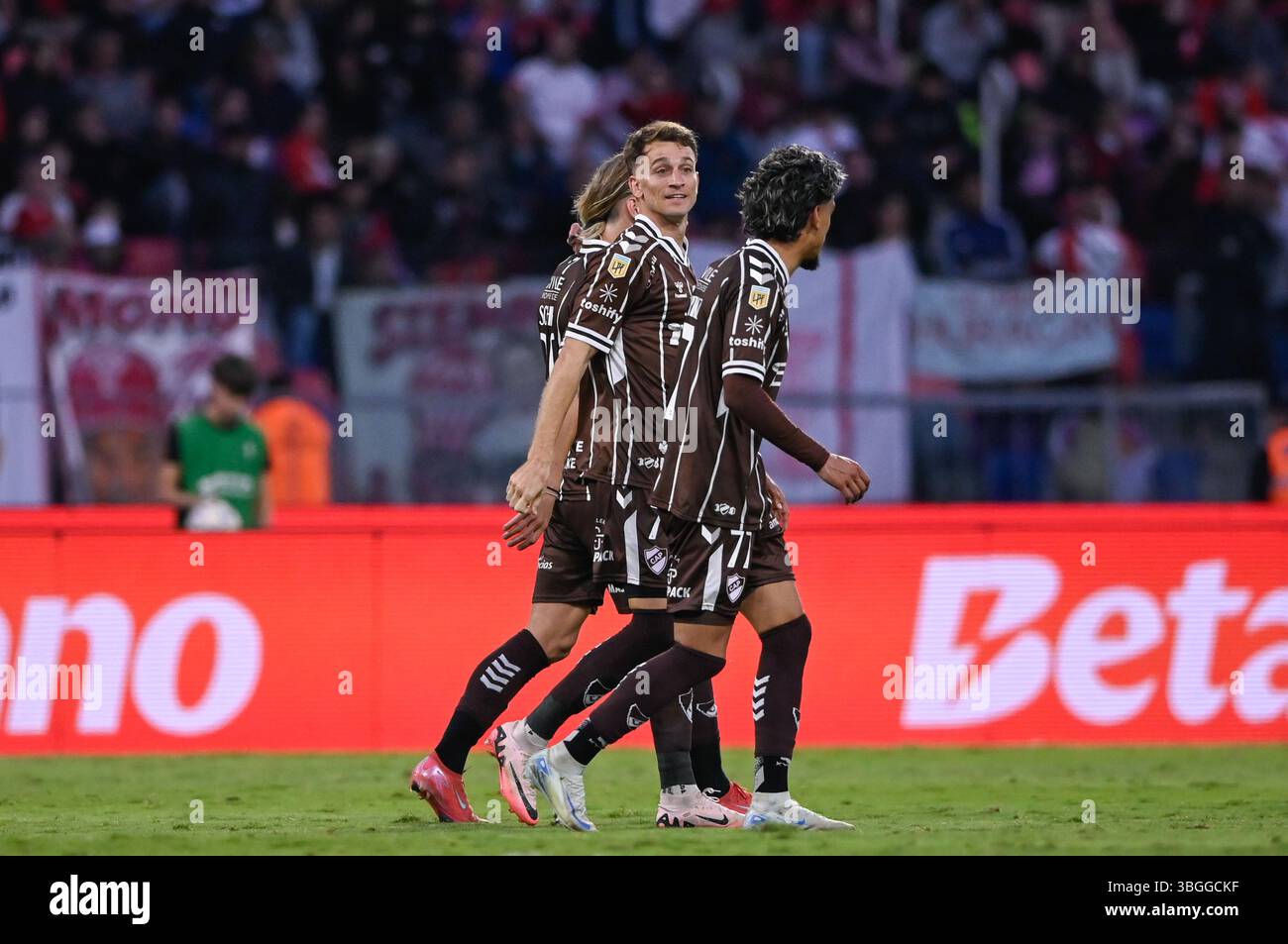 Guido Mainero (C) of Platense gestures during a soccer match between ...
