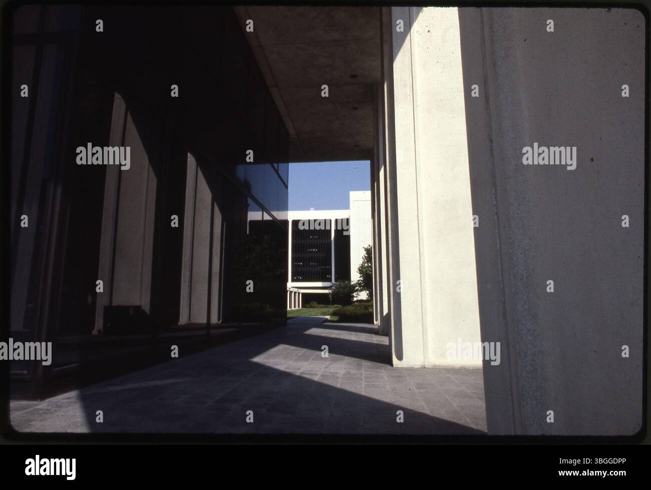A color photograph looking north through a breezeway on the east side ...