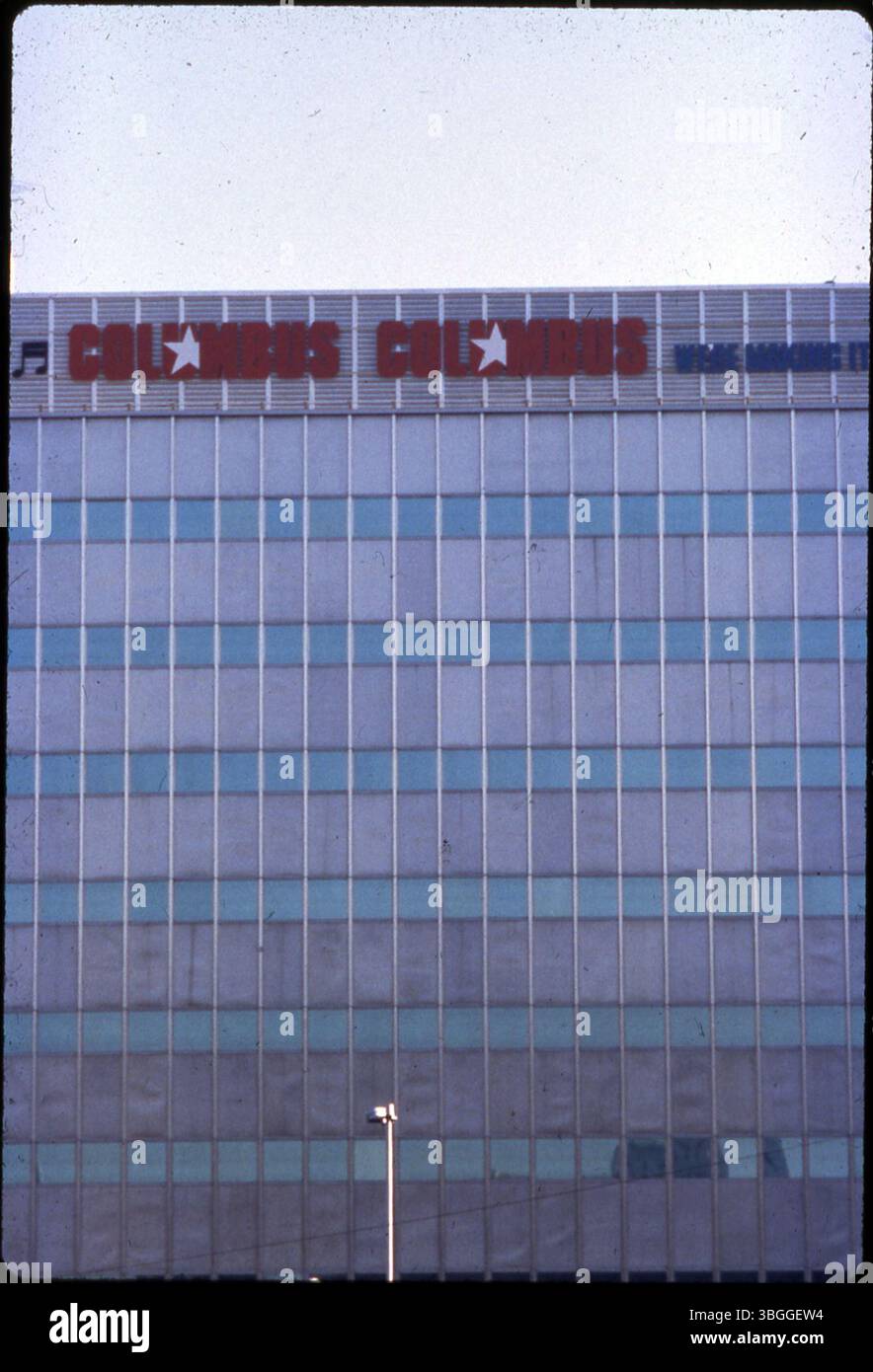 Photograph of the upper floors and signage at the top of the Columbus ...