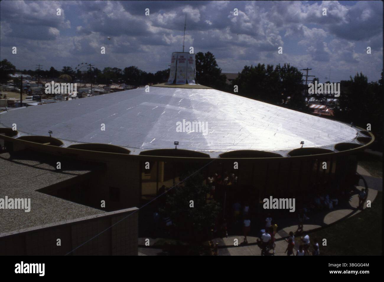 Visitors enter and exit the Ohio Building at the Ohio State Fair, which ...