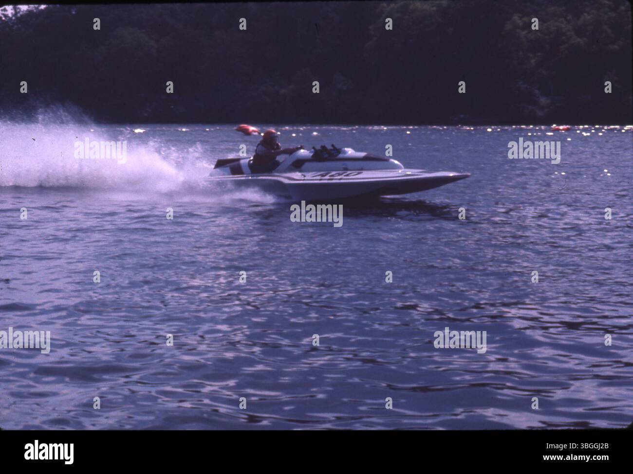A white and blue hydroplane, identified as A80, speeds along the Scioto ...