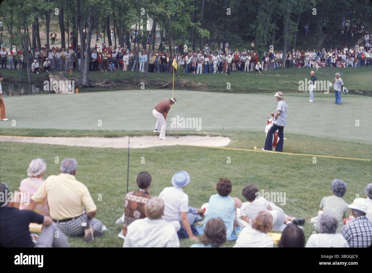 In May 1976, Grier Jones chips from a sand trap at the Memorial ...