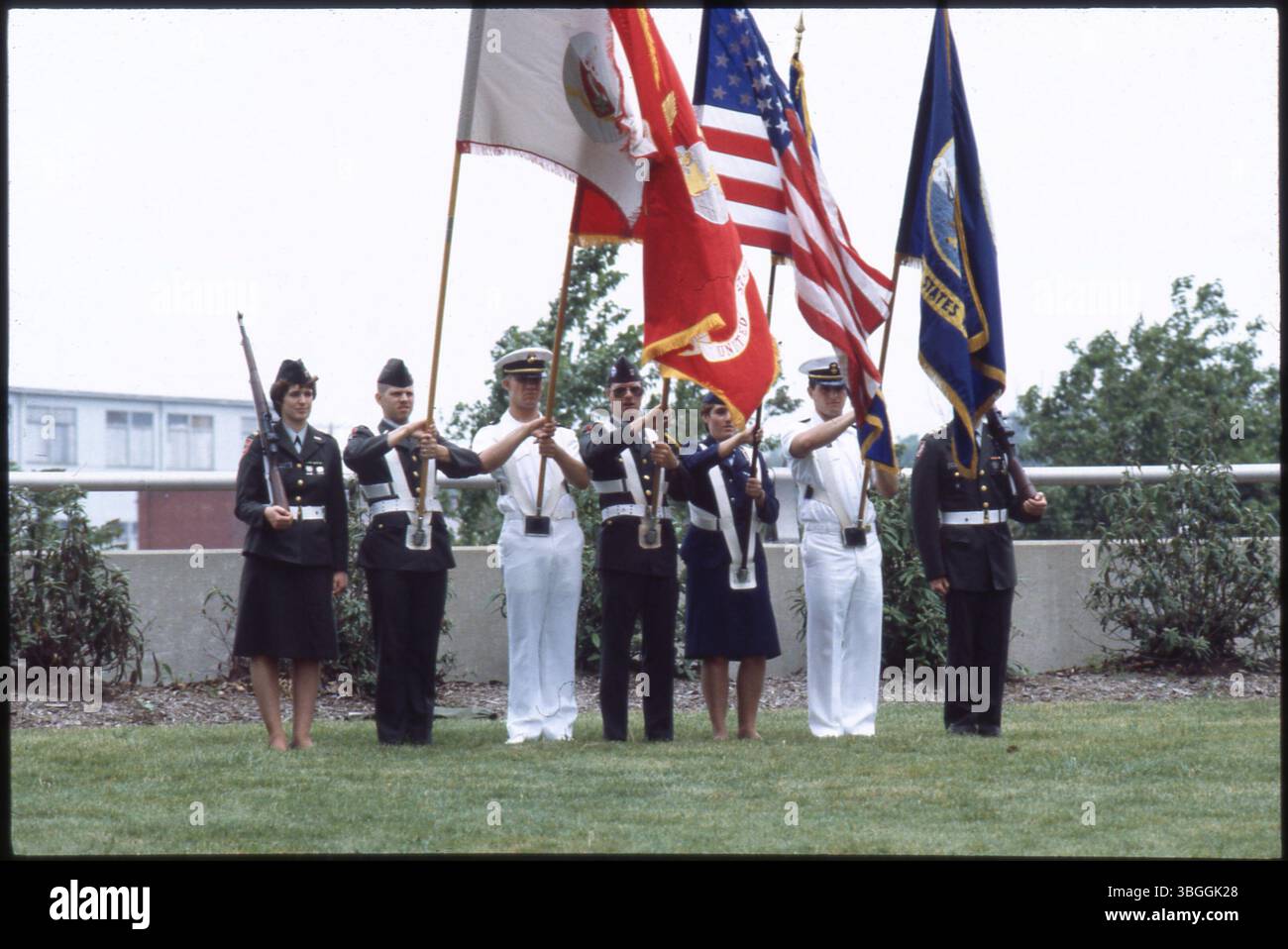 A seven-person military color guard performs at a ceremony in 1980 ...