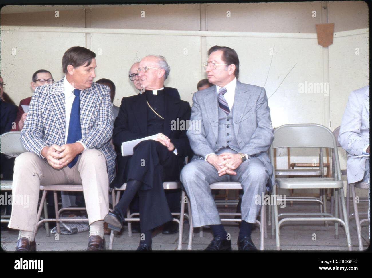 A photo showing Columbus Mayor Tom Moody seated on stage in 1980 with ...