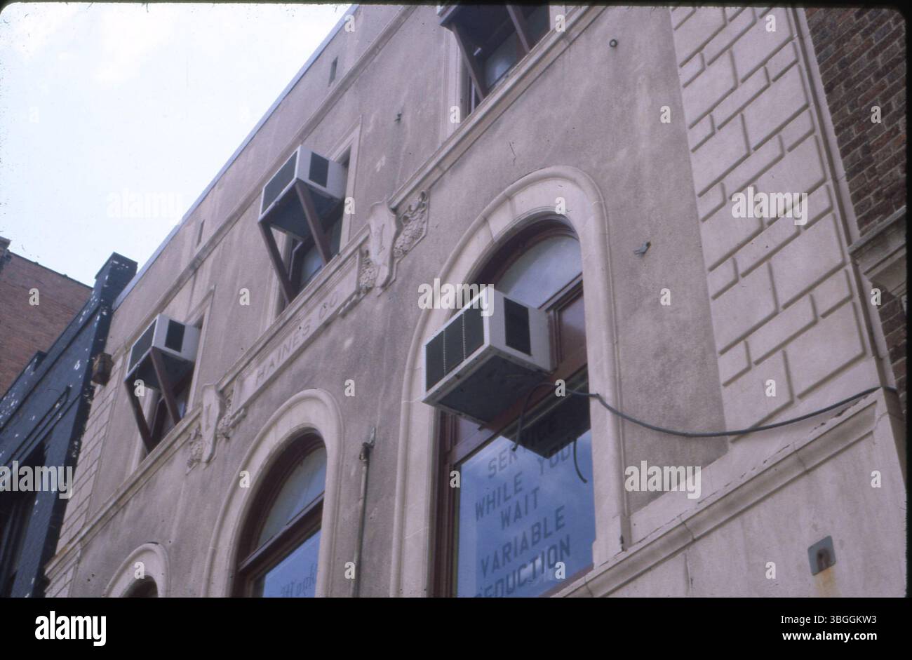The second and third-story windows of the Haines Company building ...