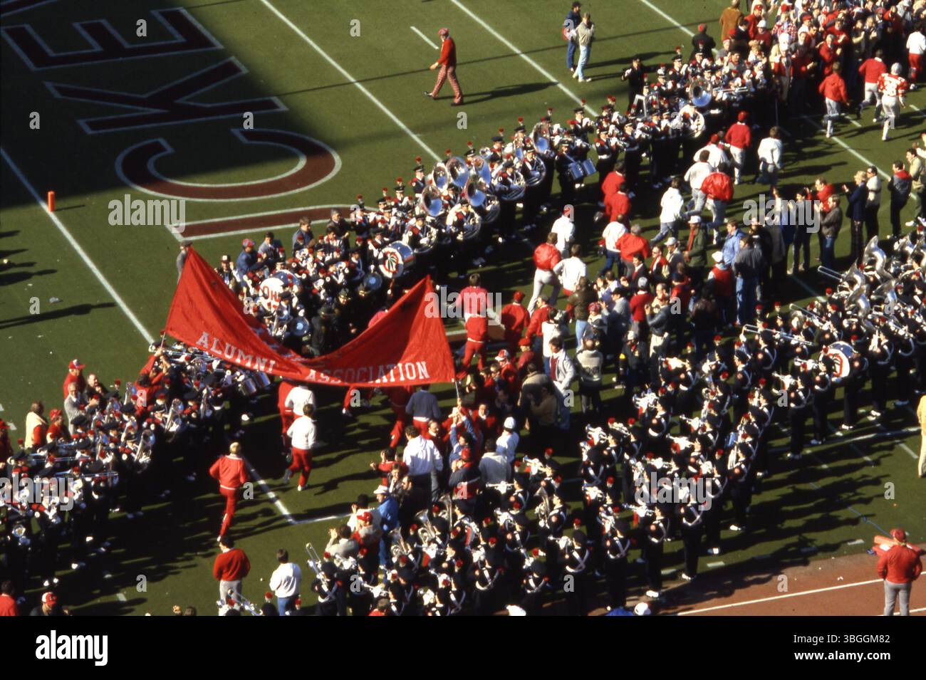 The 1987 Ohio State Buckeyes football team enters Ohio Stadium. Members of the Varsity O Alumni ...