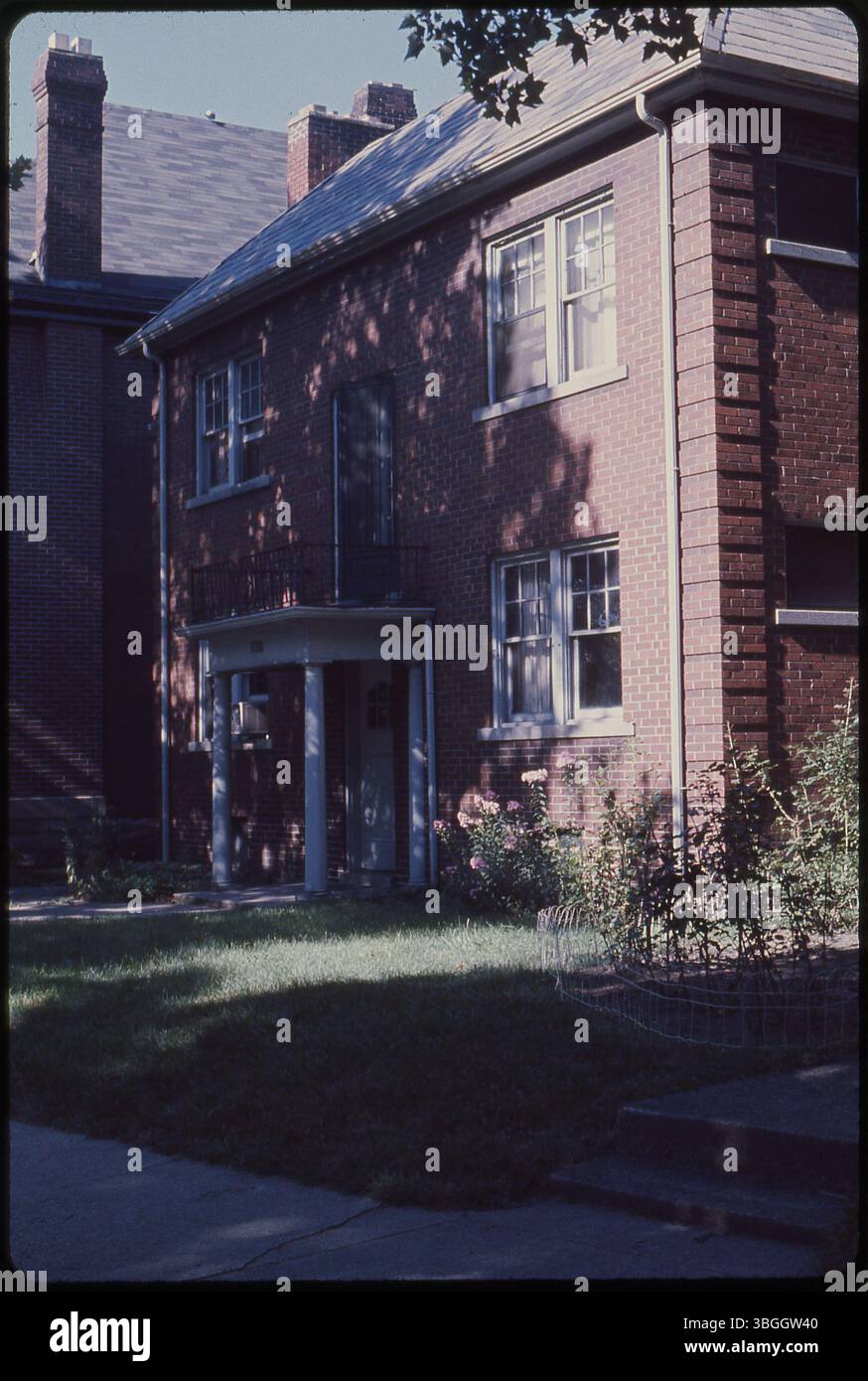 This image features a 4-unit brick apartment house at 1037 Neil Avenue ...