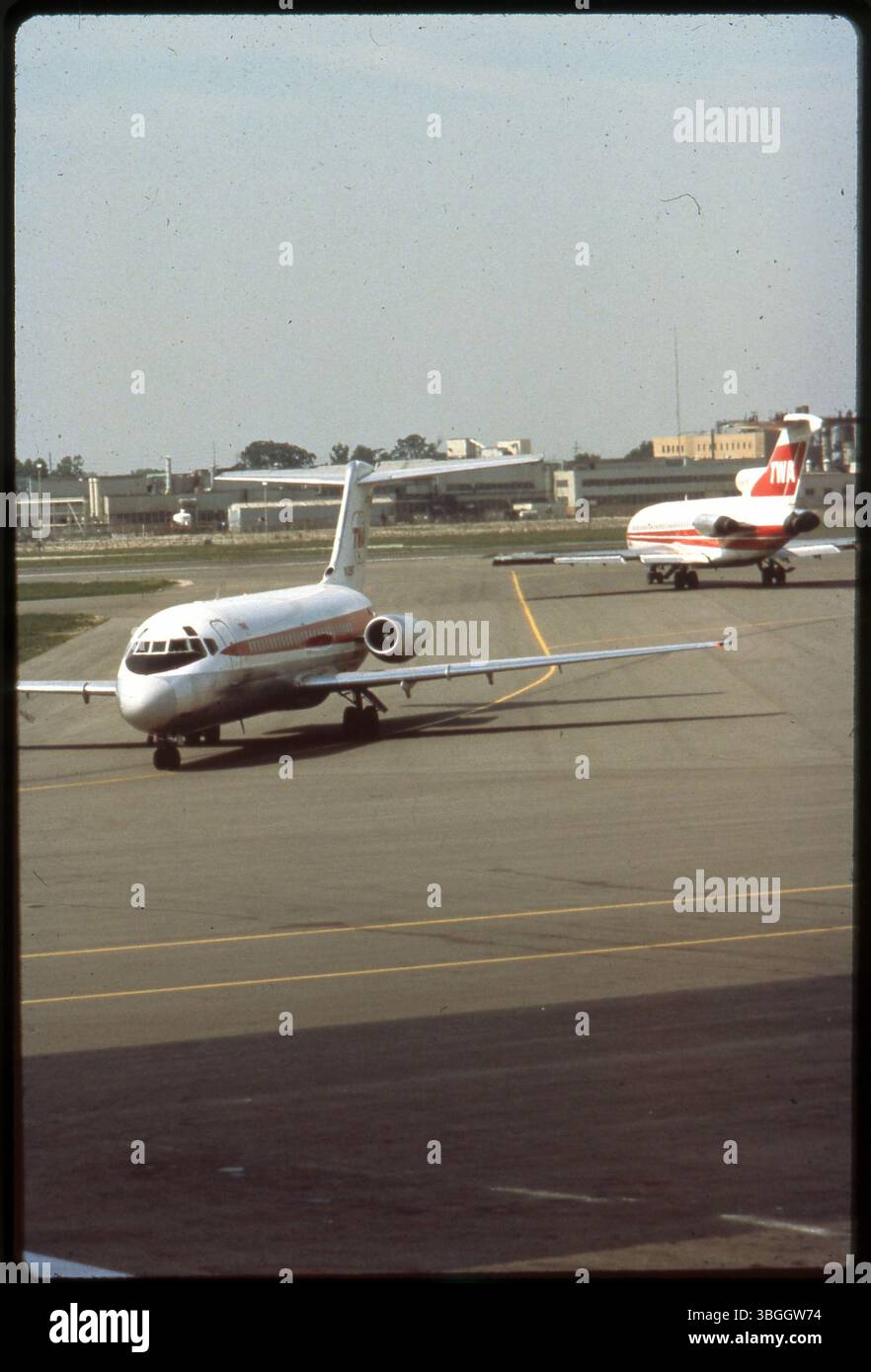 Two TWA planes are seen on the tarmac at Port Columbus International ...