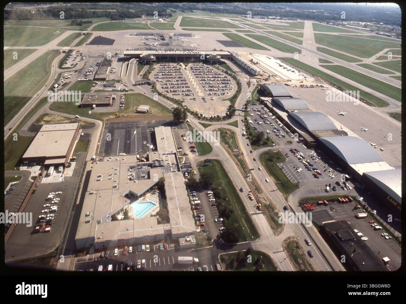 An aerial view from 1989 looking southeast towards the terminal complex ...