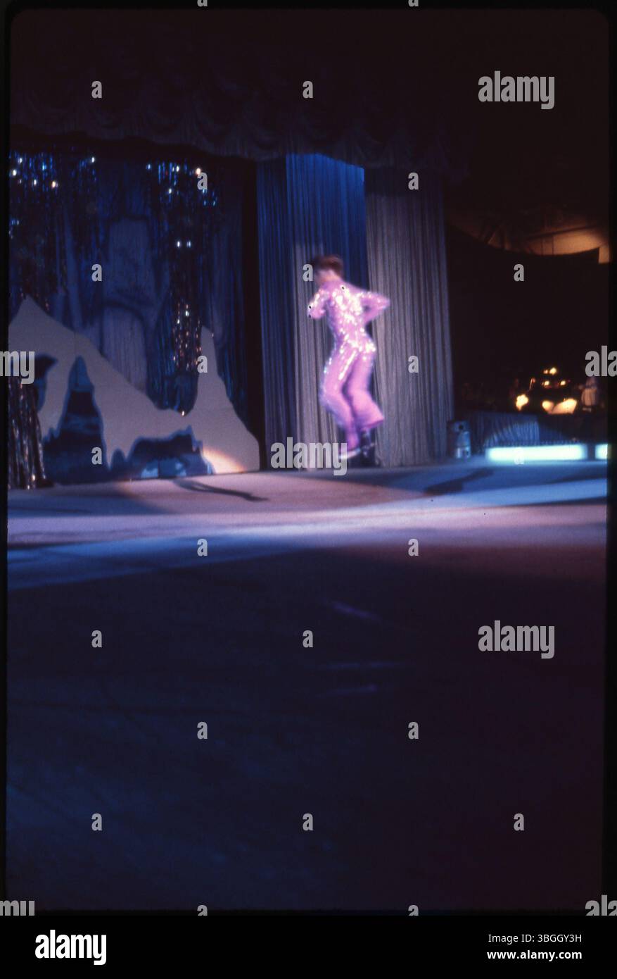 A figure skater performs a spin during the Ice Follies and Holiday on ...