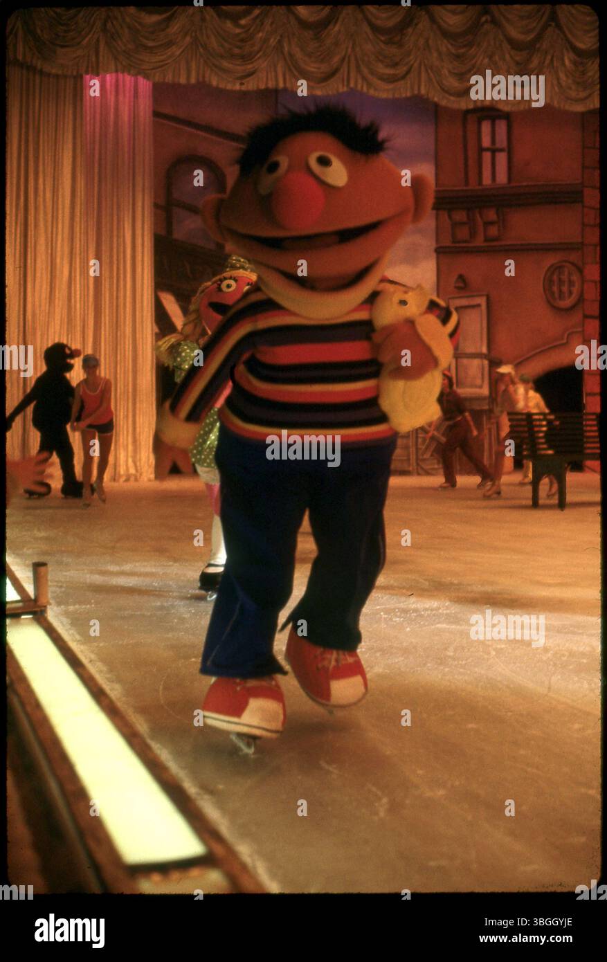 Sesame Street characters, Ernie and Grover, join figure skaters in an ...