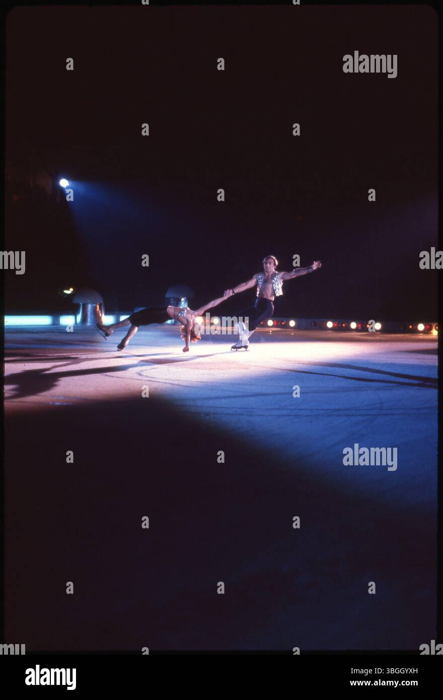 A figure skating pair performs a spin at the Ice Follies and Holiday on ...