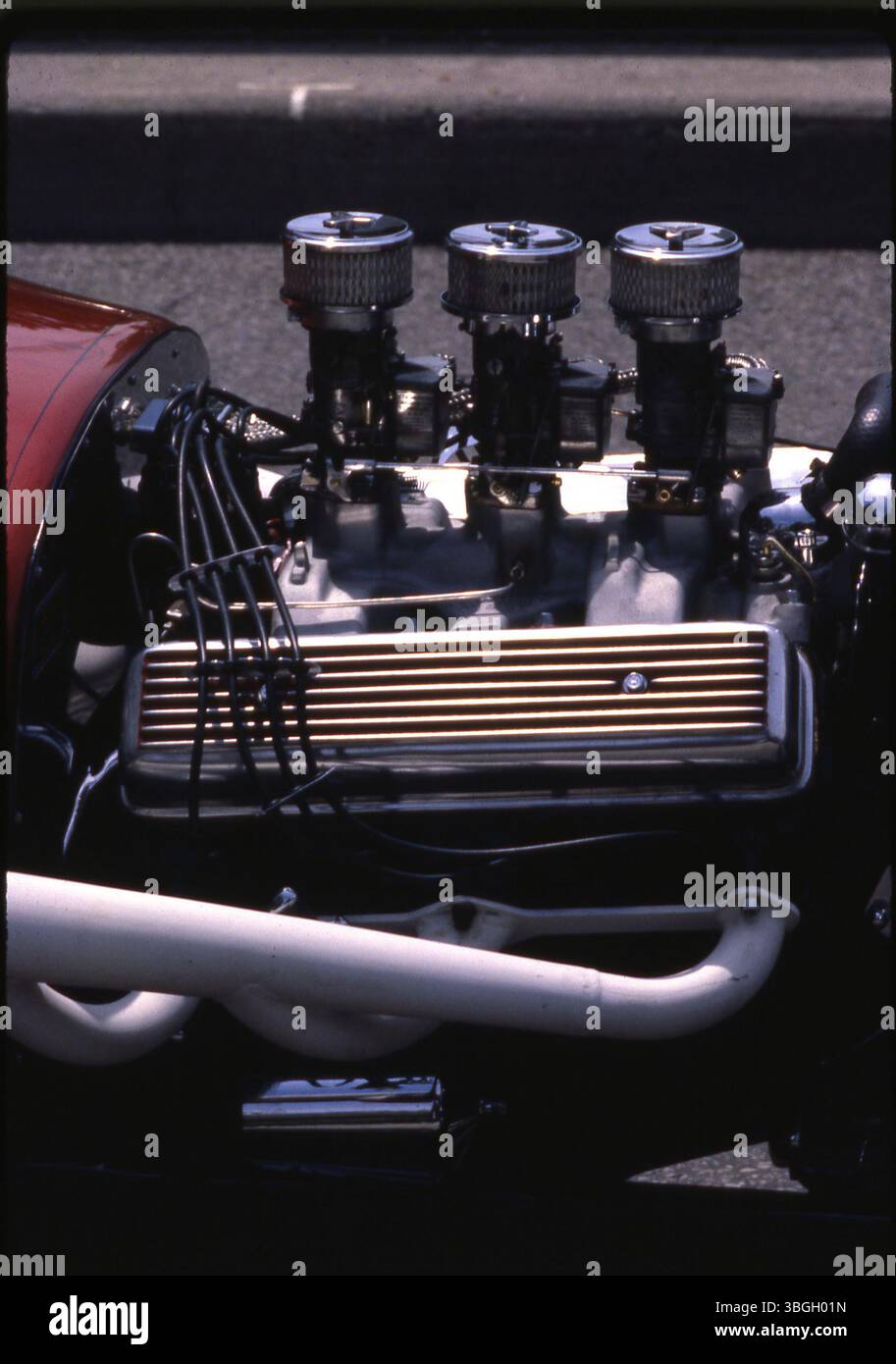 A vintage car engine is displayed at an unidentified car show in 1980 ...