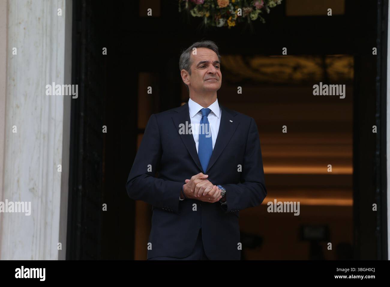 The Greek Prime Minister Kyriakos Mitsotakis while he's waiting the ...