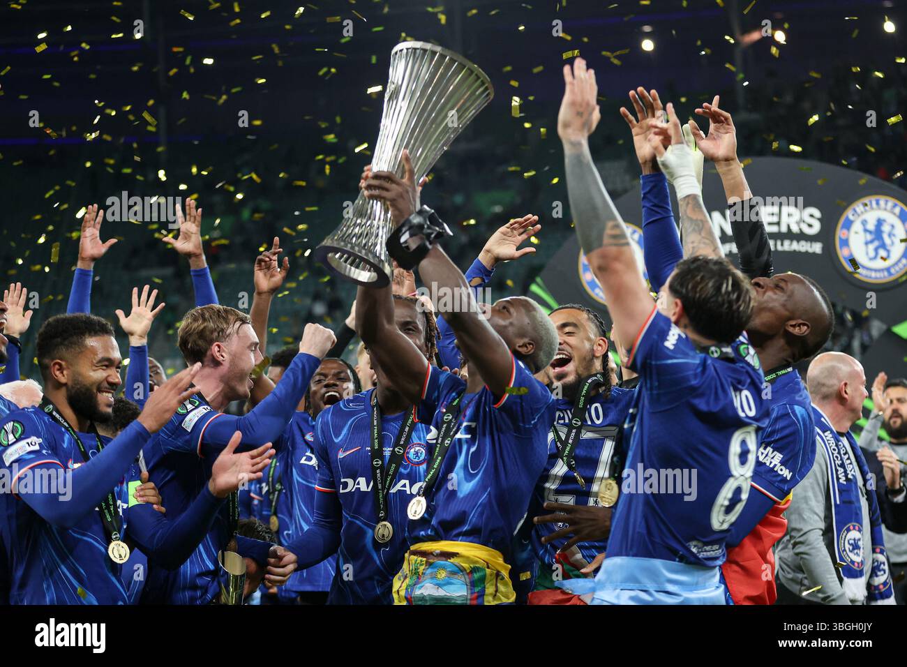 Players of Chelsea London hold the trophy at the ceremony after the ...