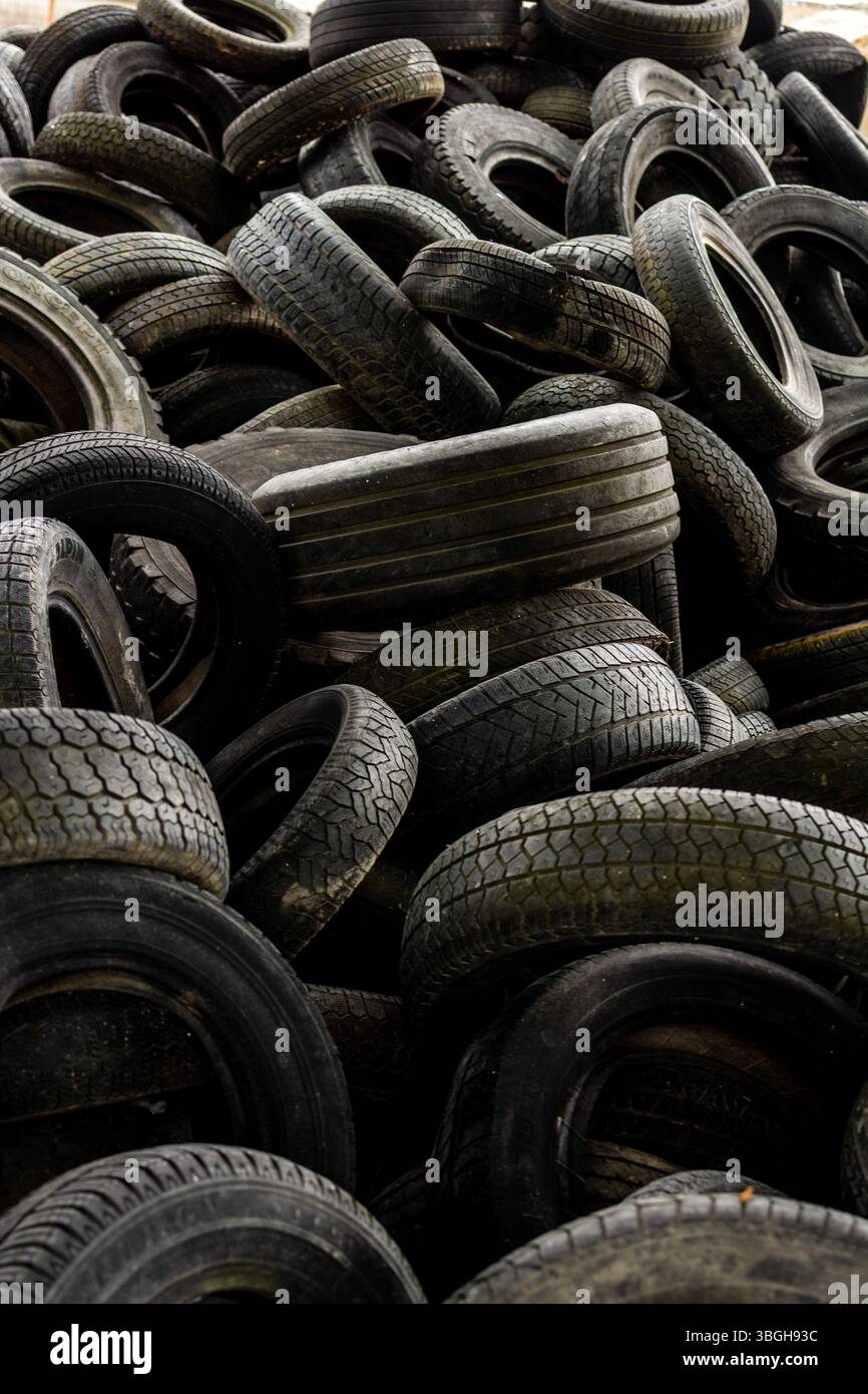 Large collection discarded tires hi-res stock photography and images ...