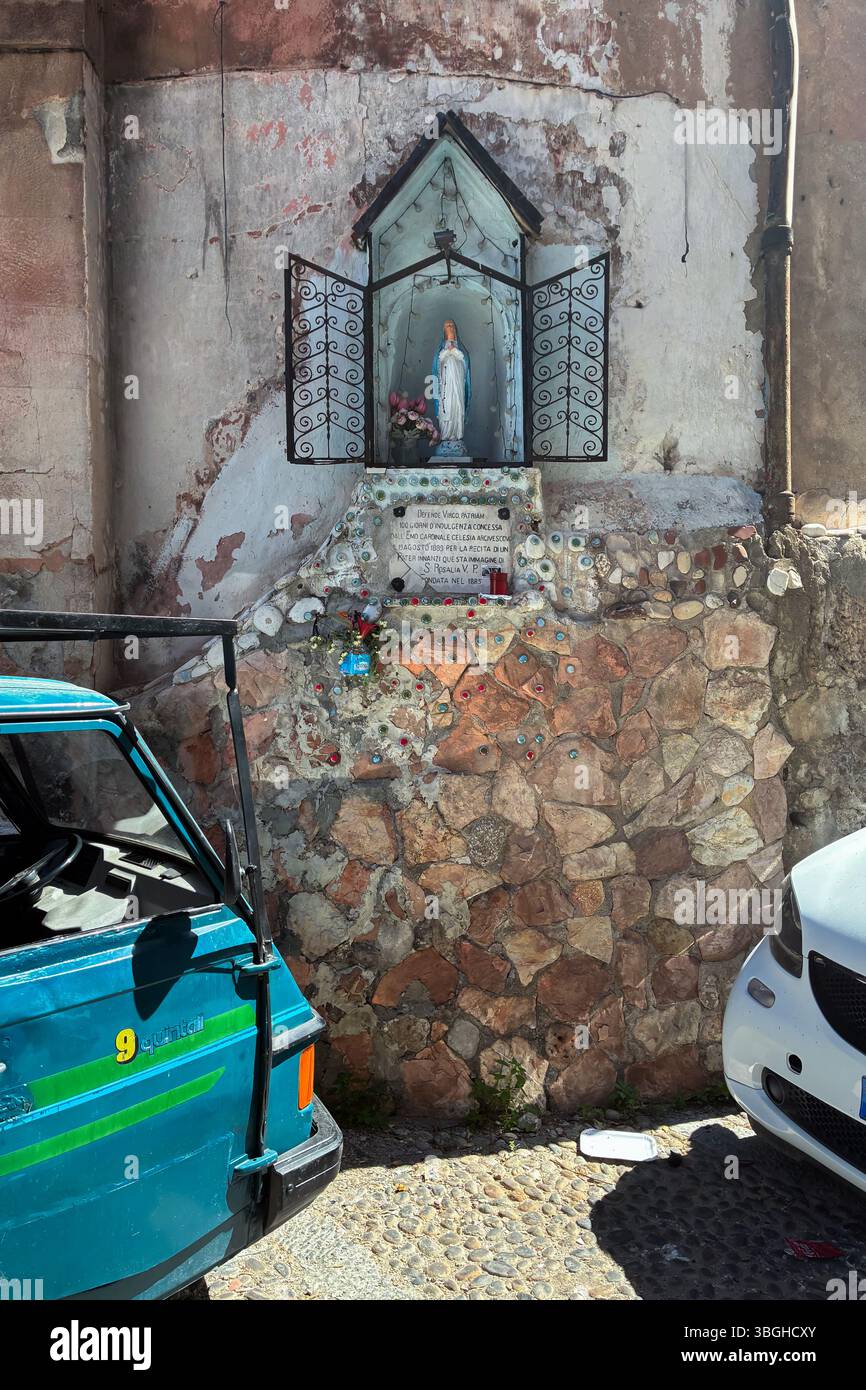 Small shrine on a wall in the streets of Palermo, Sicily Stock Photo ...