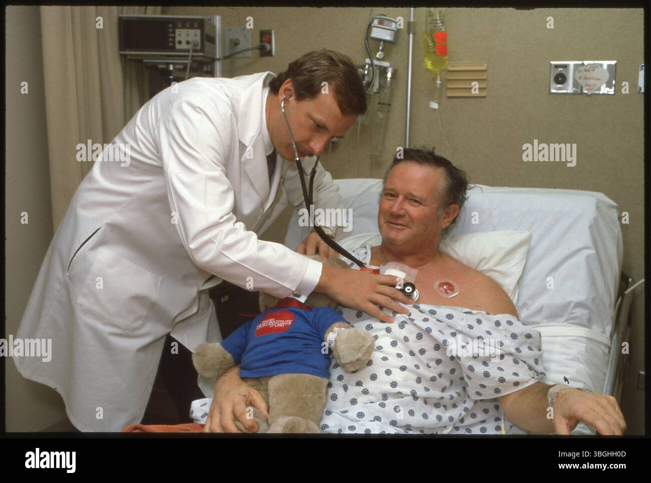A male doctor checks the condition of the 1,000th open-heart surgery ...