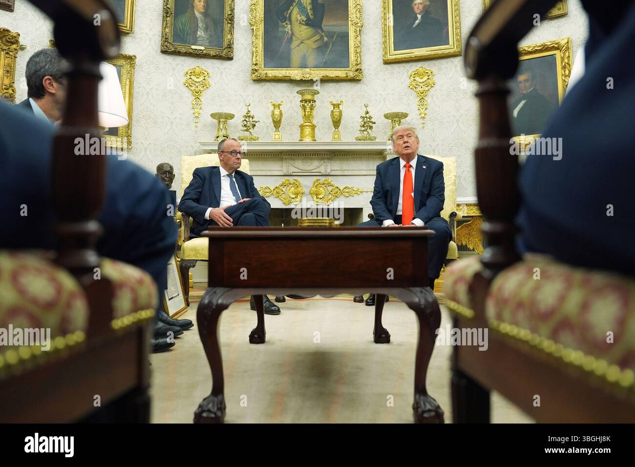 President Donald Trump, right, meets Germany's Chancellor Friedrich ...