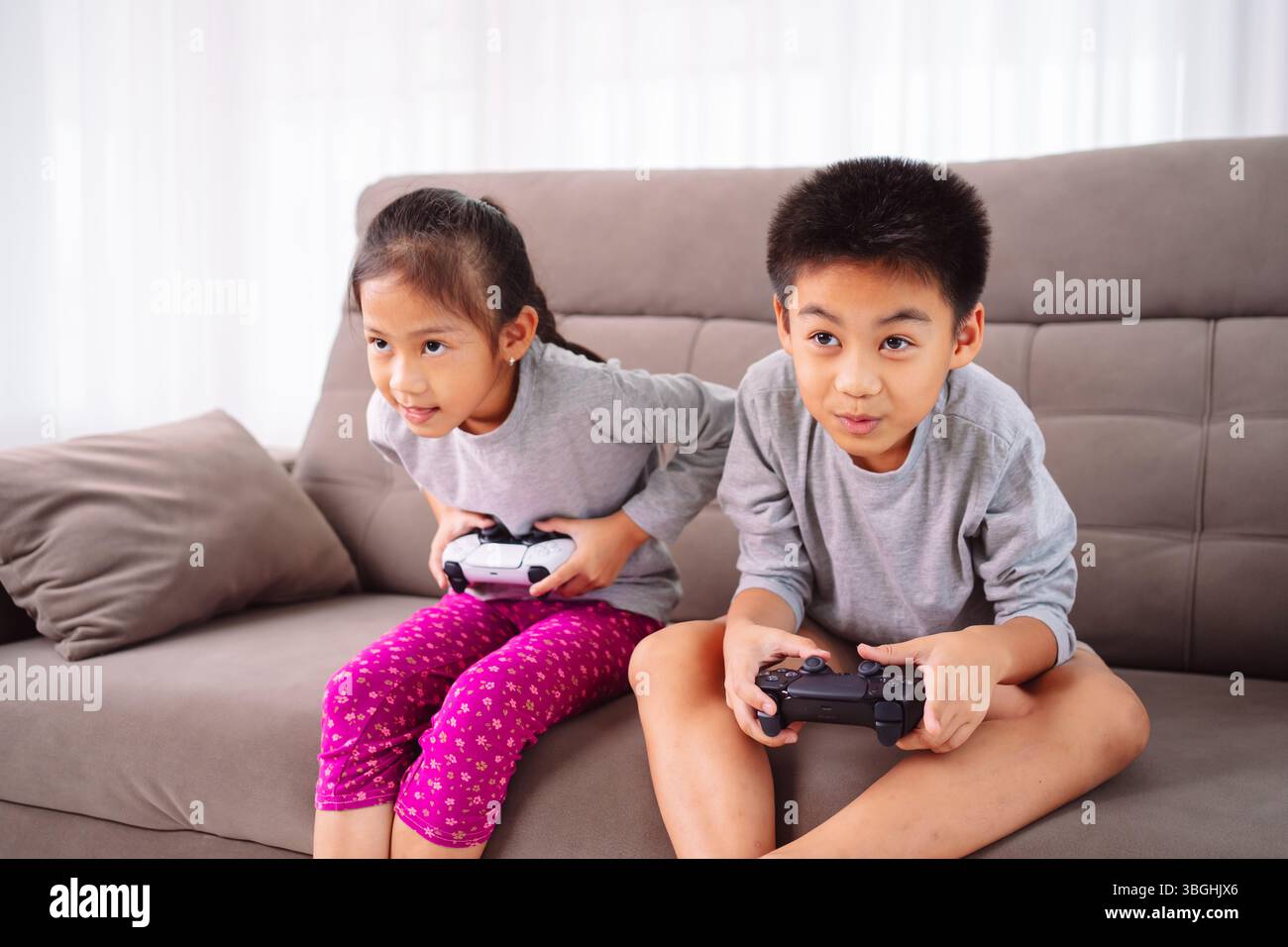 Child Asian Playing Video Game Friends Boy Girl Entertainment Video ...