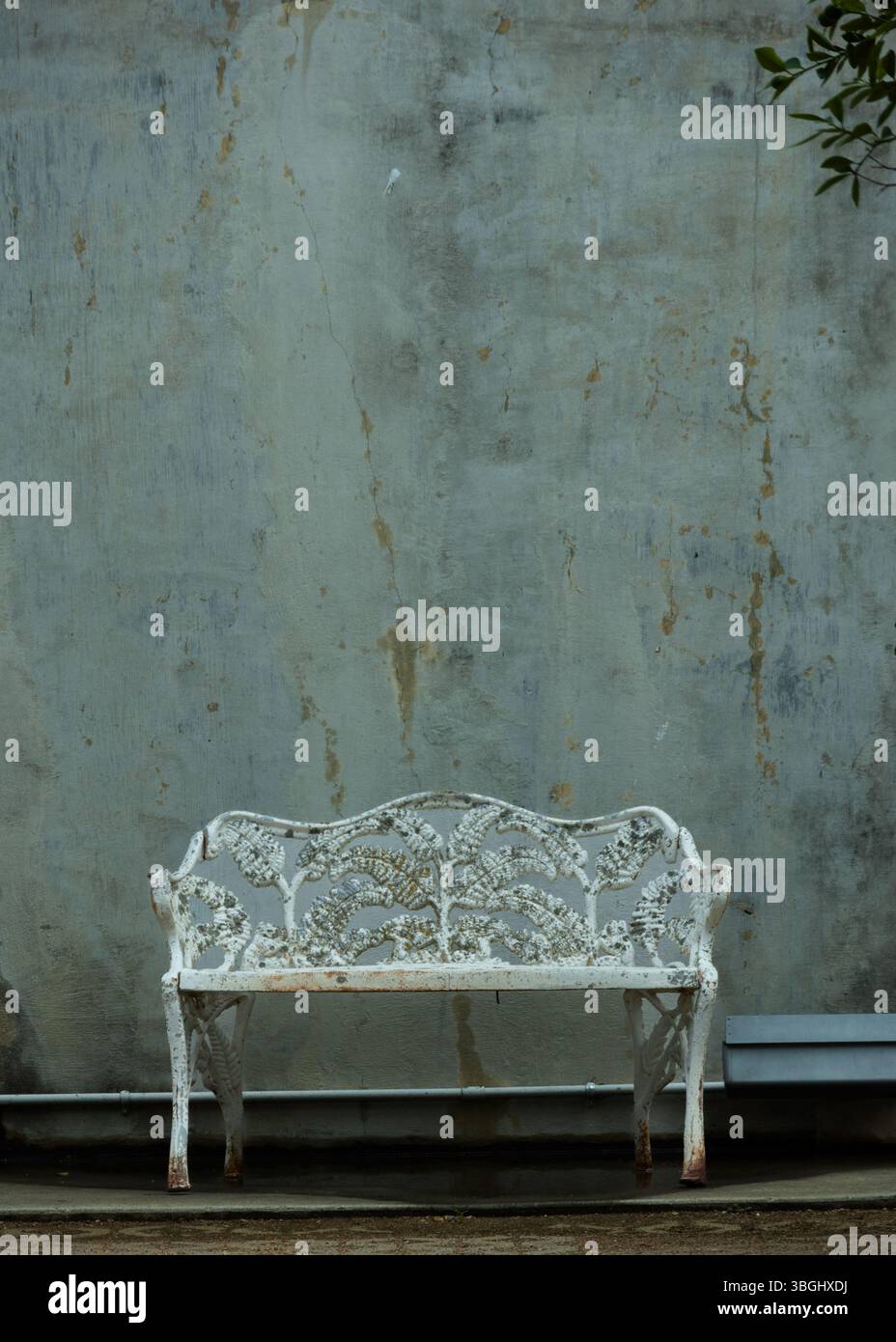 A creepy, alone rusty bench in an abandoned haunted garden Stock Photo ...