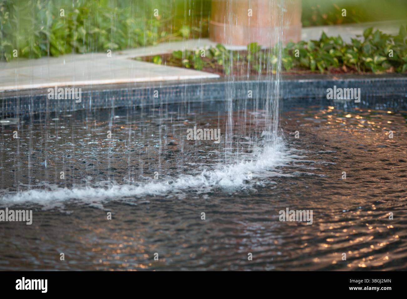 Fountain, water feature, bubbling water Stock Photo - Alamy