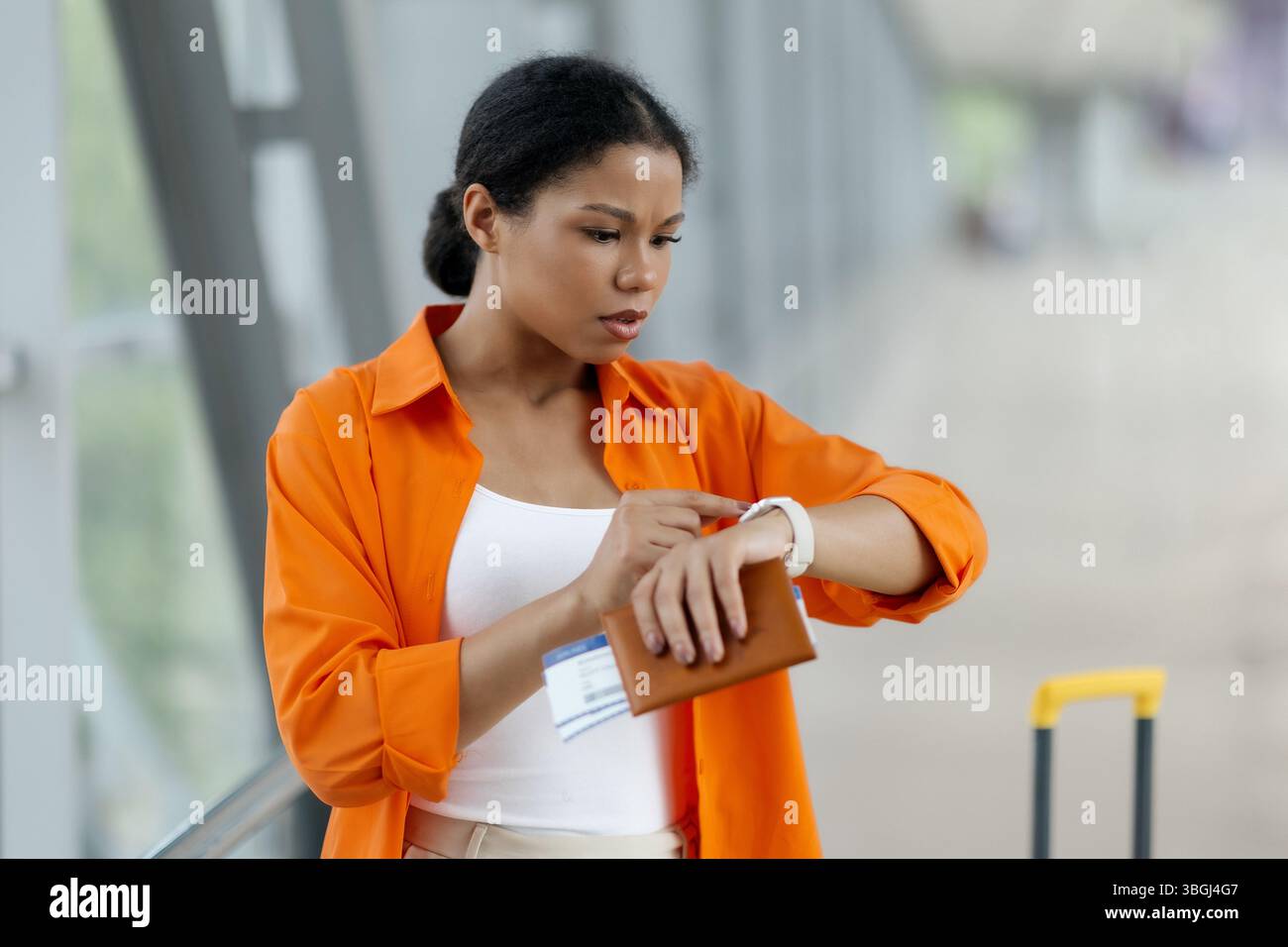 Late To Flight. Worried Black Woman Checking Time On Wristwatch At ...