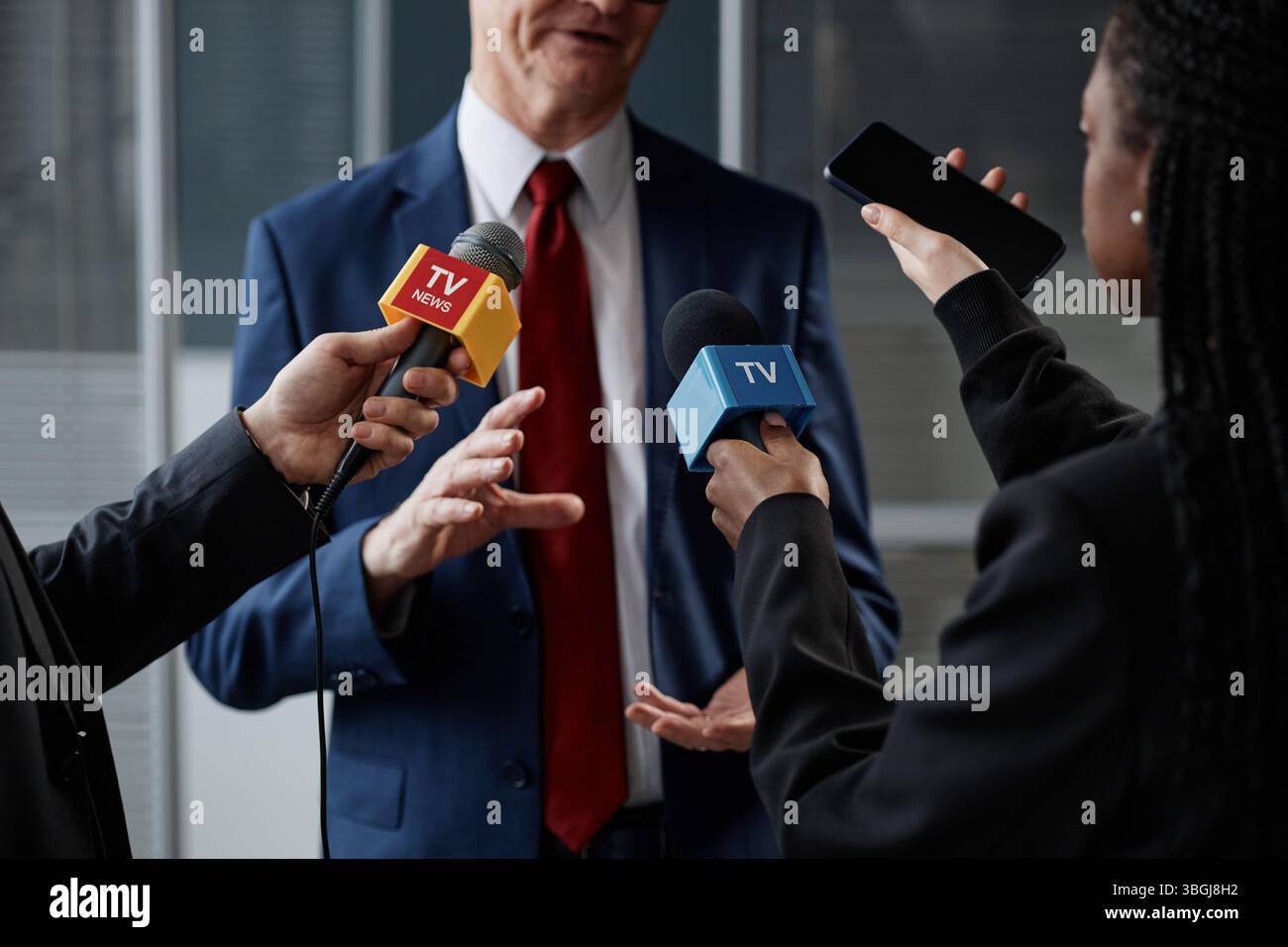 Cropped shot male journalist giving hi-res stock photography and images - Alamy