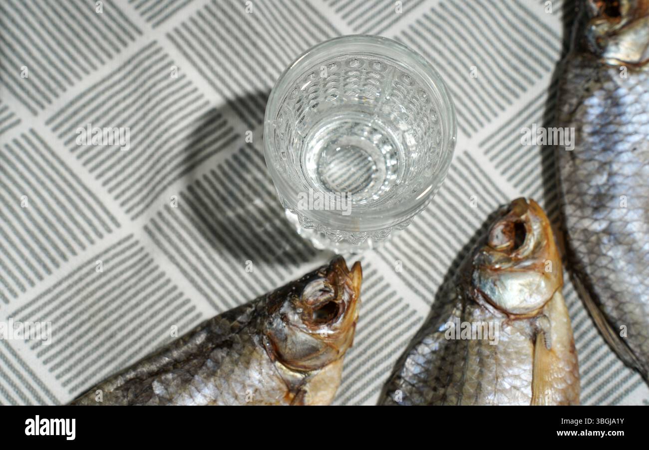 Dried Fish and Vodka Glass on Patterned Tablecloth – Traditional ...