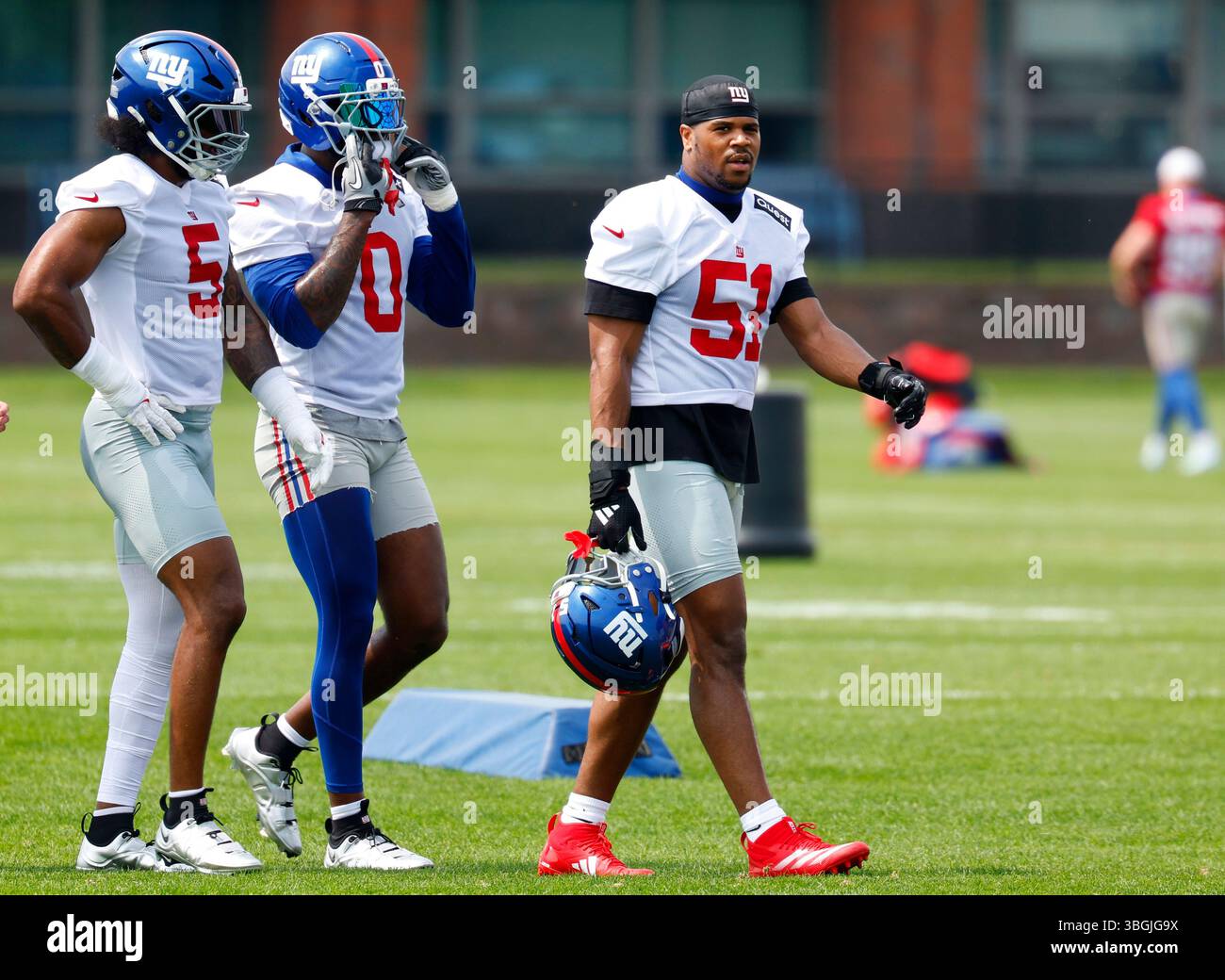 New York Giants linebackes Abdul Carter (51), Kayvon Thibodeaux (5) and ...